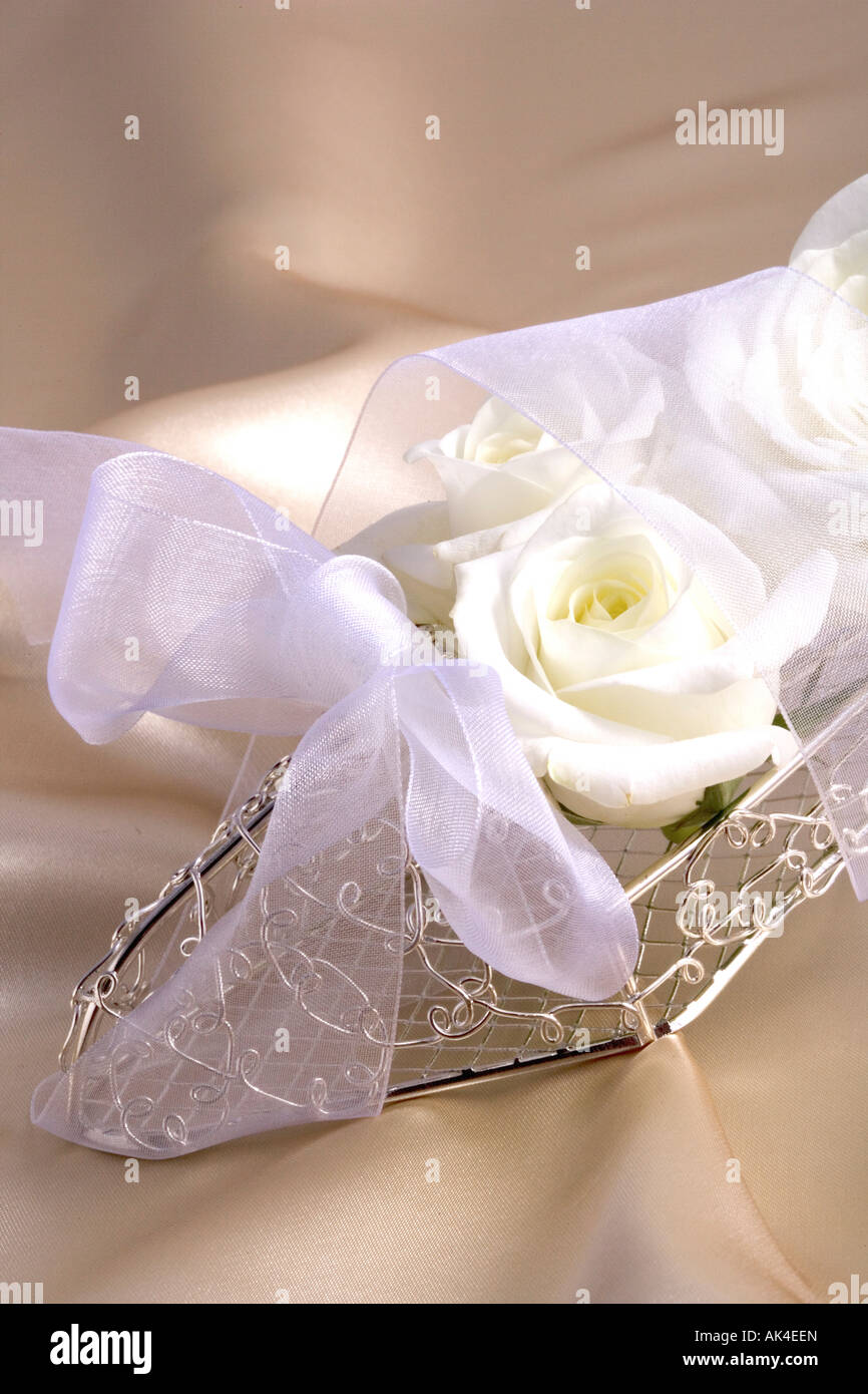 White roses and ribbon Stock Photo - Alamy