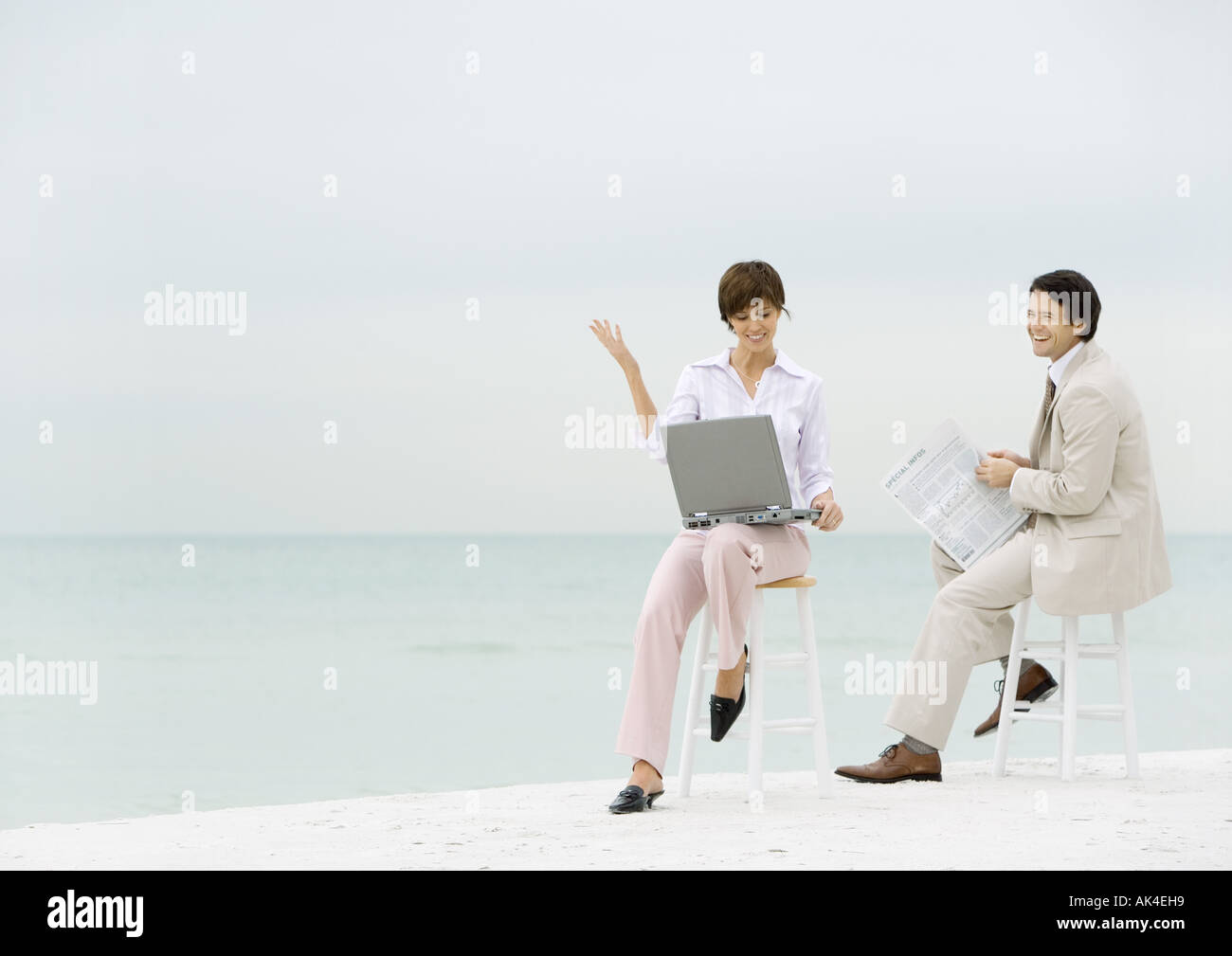 People Sitting On Stools Stock Photos & People Sitting On Stools Stock ...