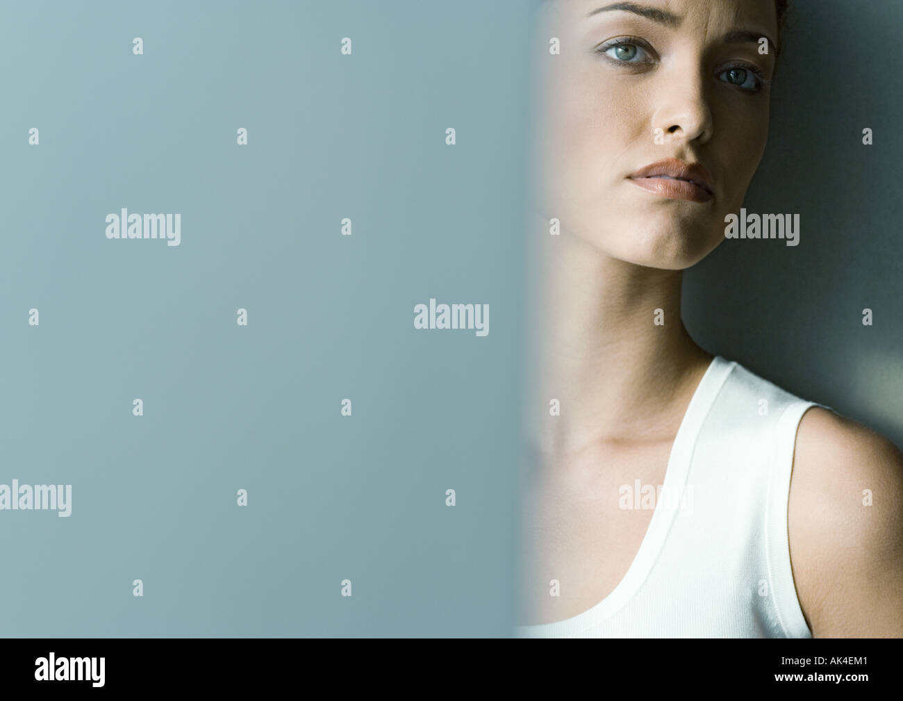 Woman furrowing brow Stock Photo - Alamy