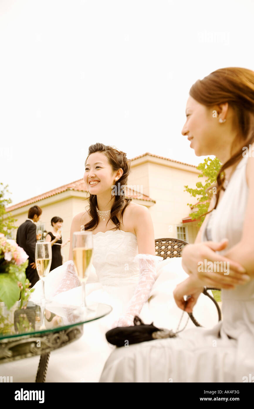 Bride having fun at wedding reception Stock Photo - Alamy