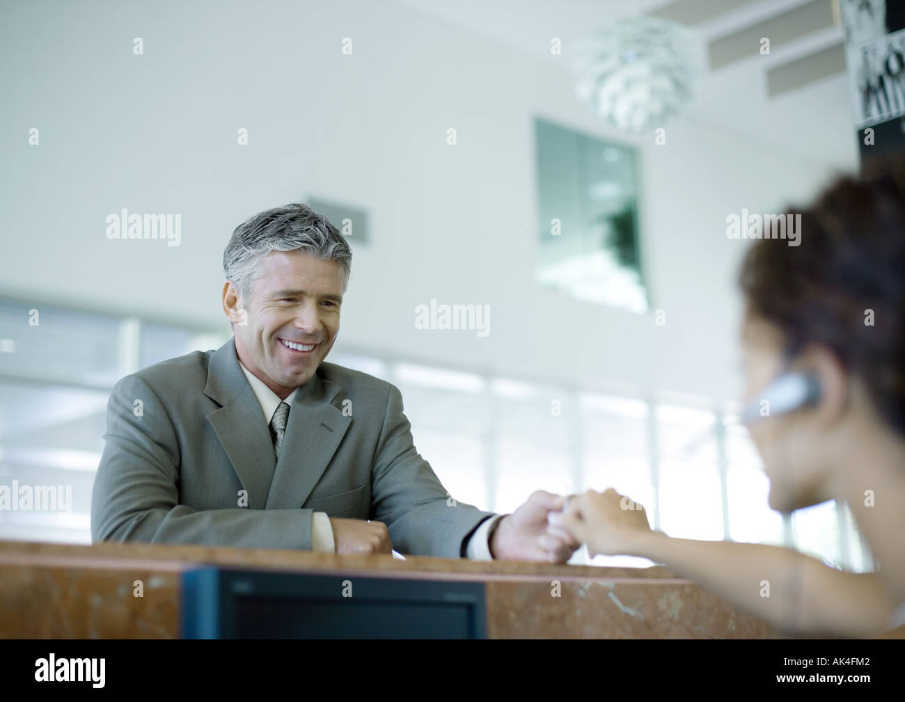 Businessmen holding hands of each other hi-res stock photography and ...