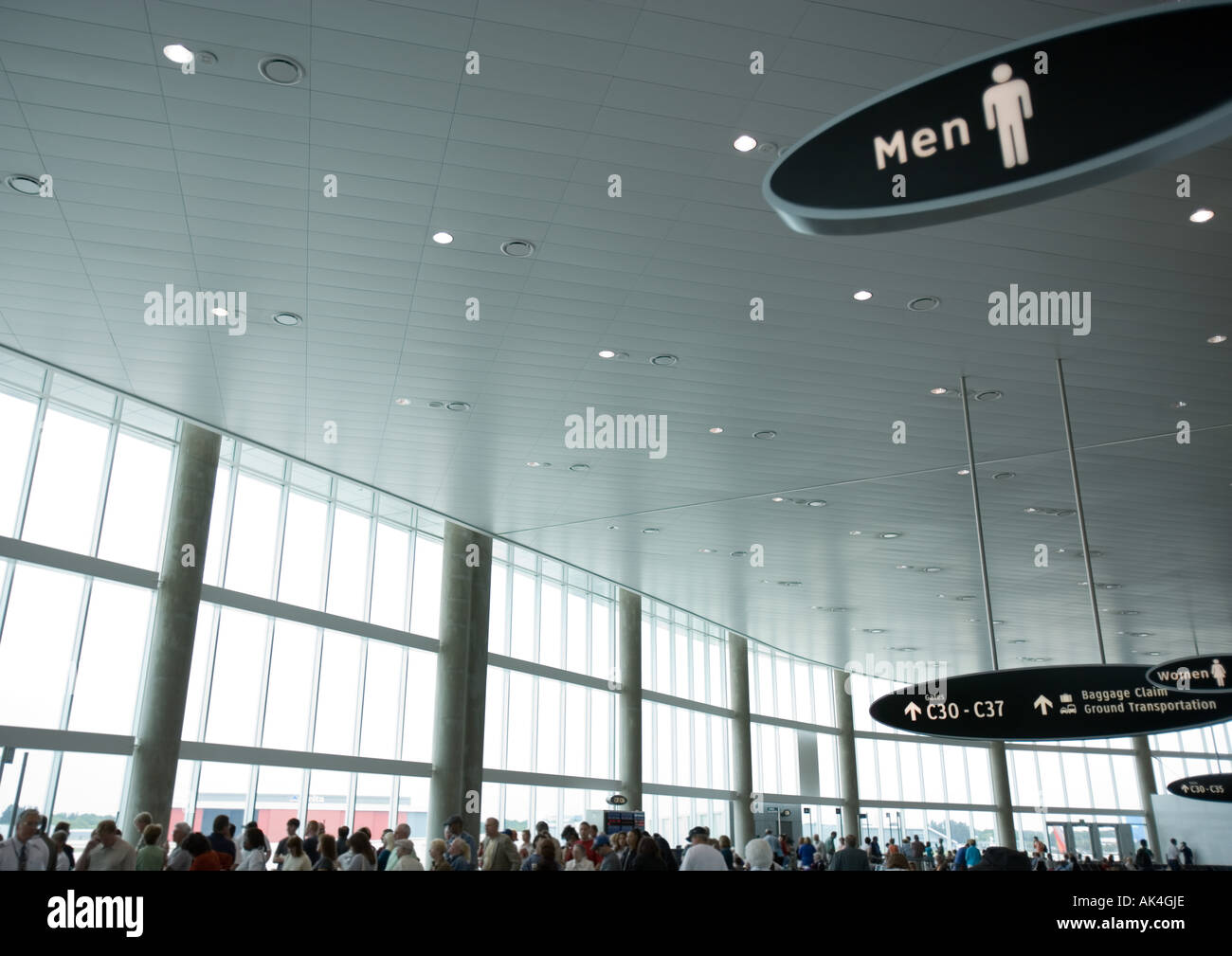 Men's restroom sign in airport Stock Photo - Alamy