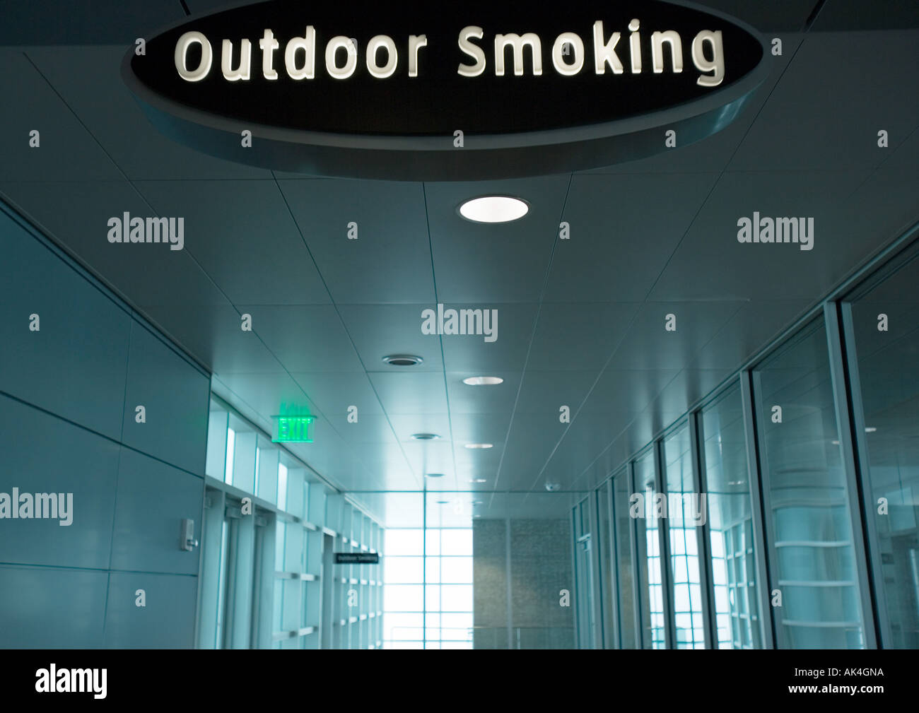Outdoor smoking sign in airport Stock Photo - Alamy