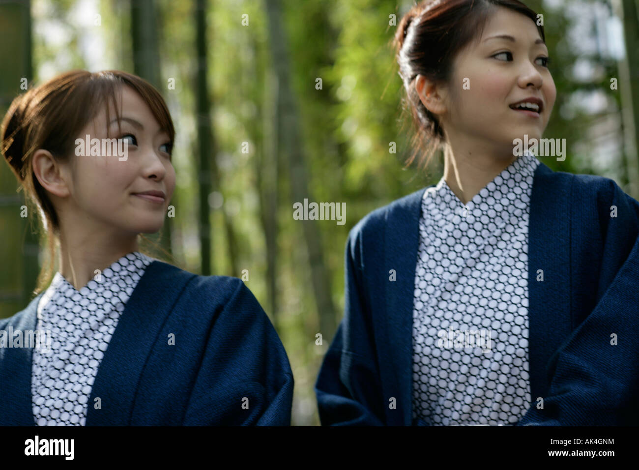 Two women in blue robe, close-up Stock Photo - Alamy