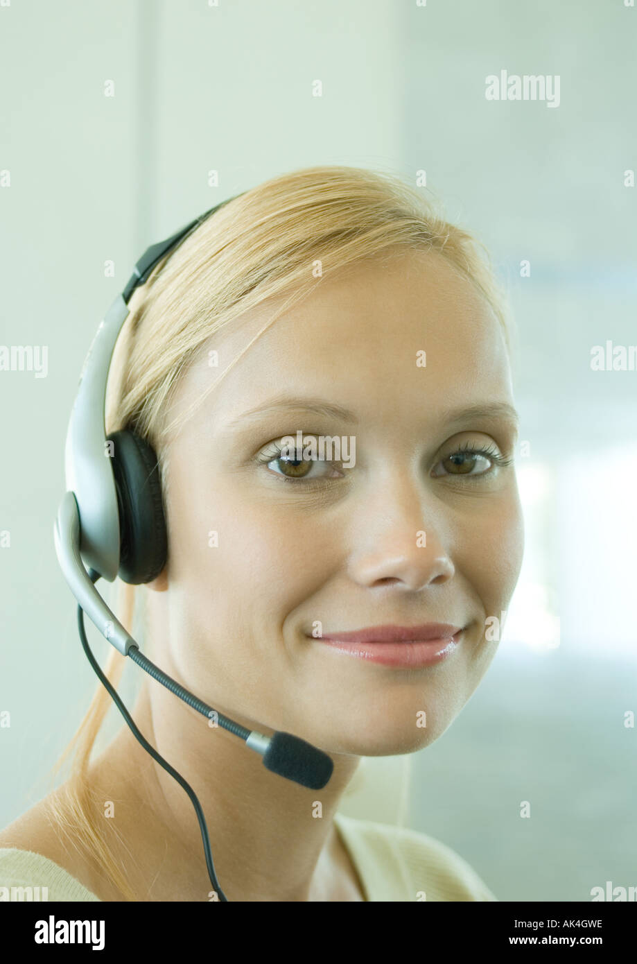 Woman wearing headset Stock Photo - Alamy