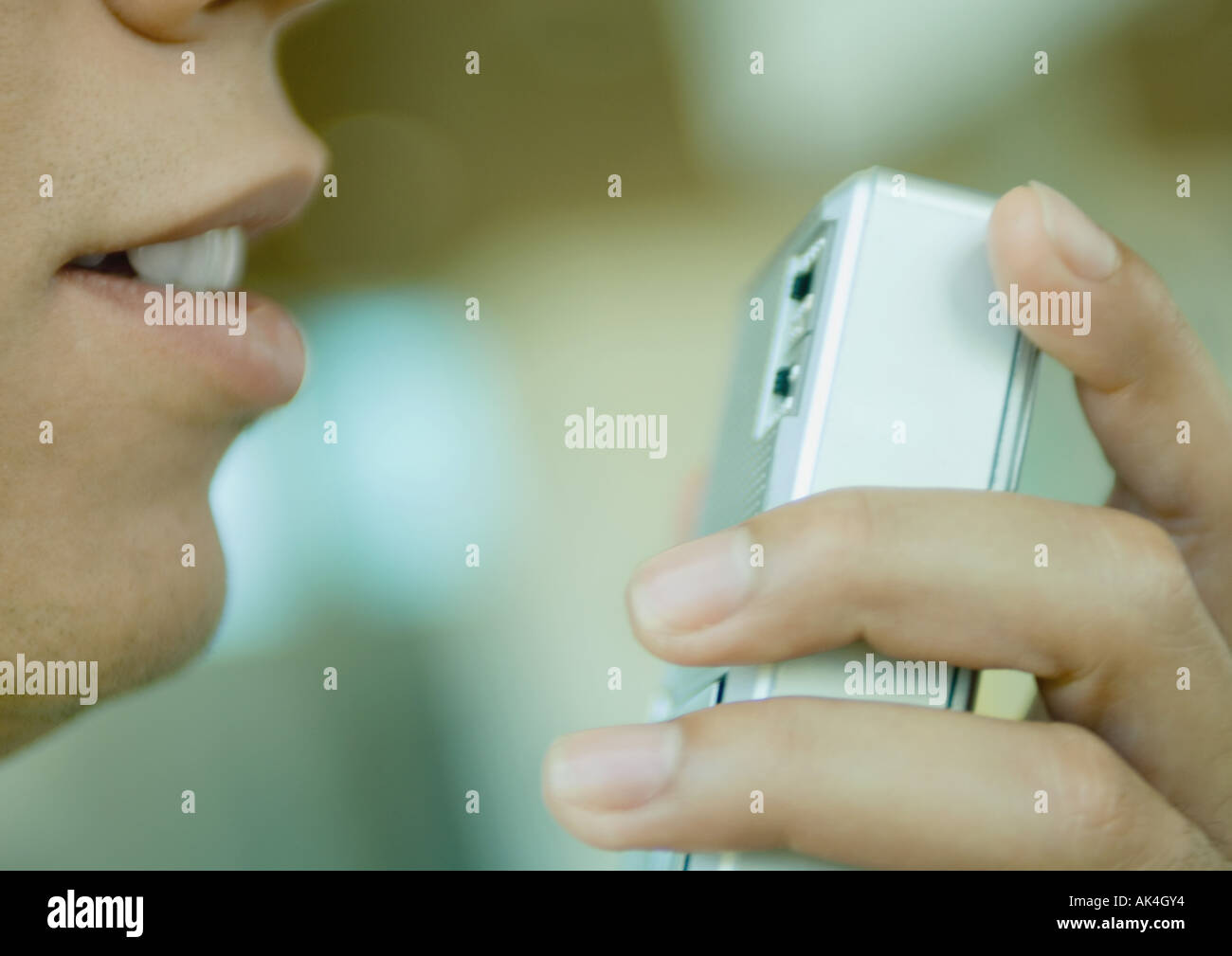 Man using dictaphone Stock Photo - Alamy