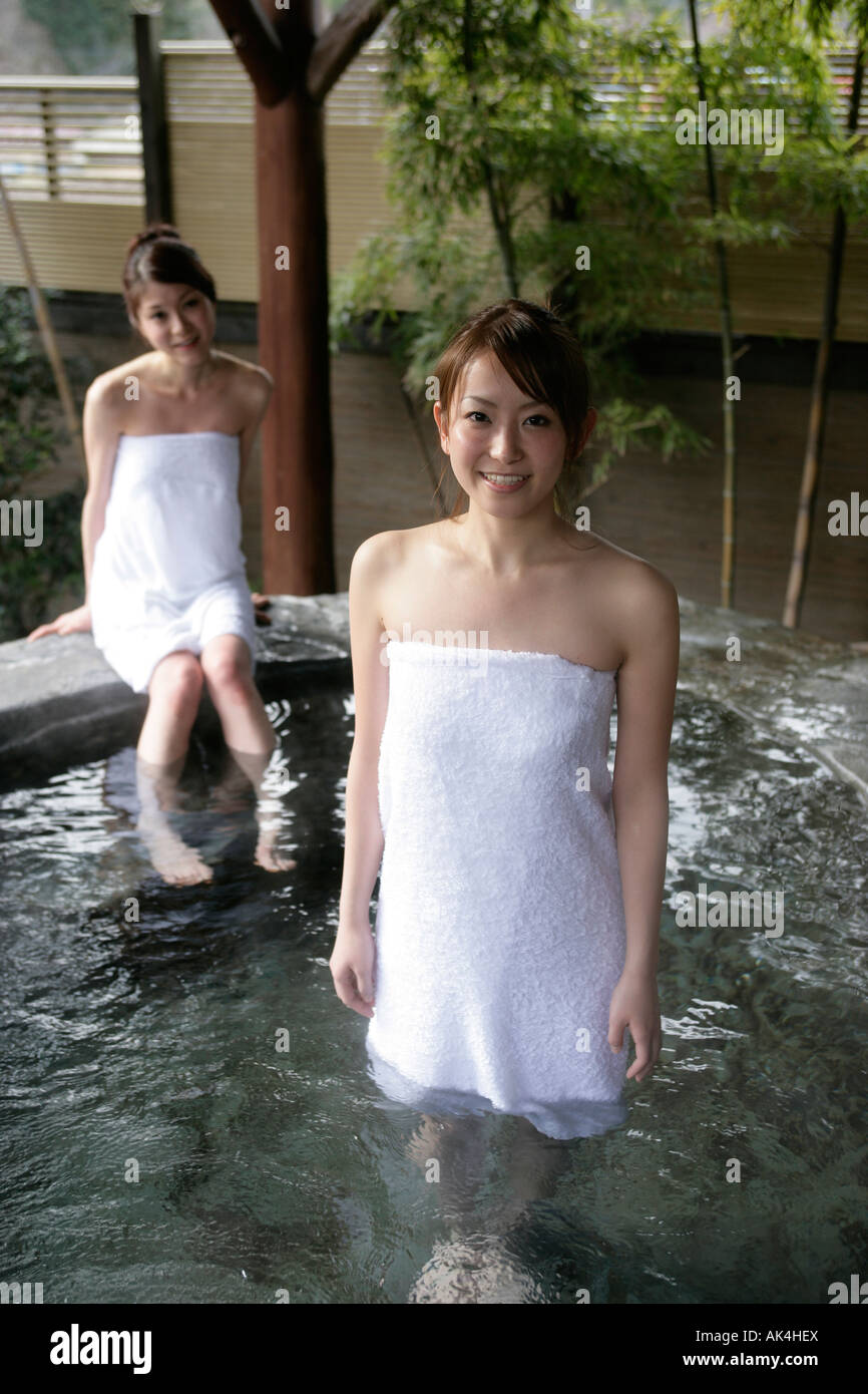 Two women soaking in hot tub Stock Photo - Alamy