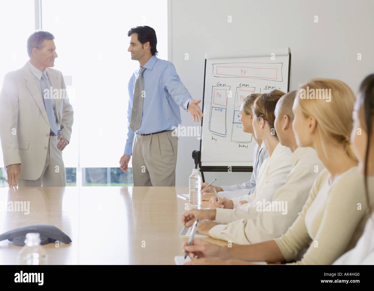In boardroom, businessman introducing ceo to business team Stock Photo ...