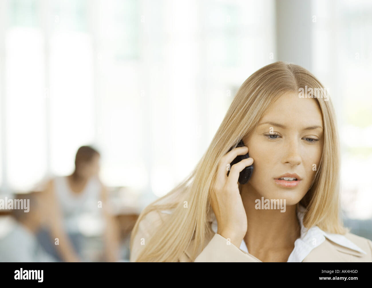 Concerned blonde woman using hi-res stock photography and images - Alamy