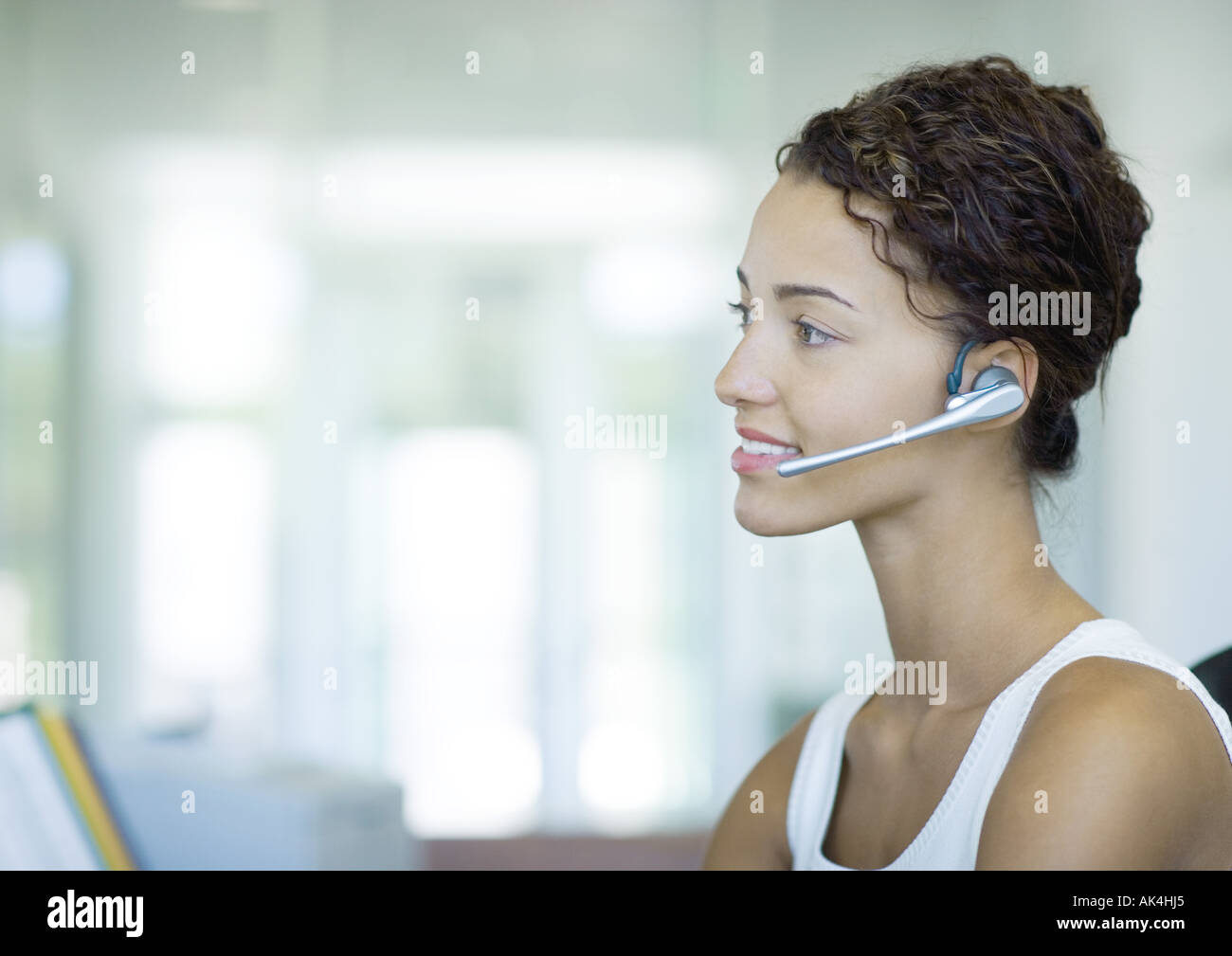 Woman wearing headset Stock Photo - Alamy