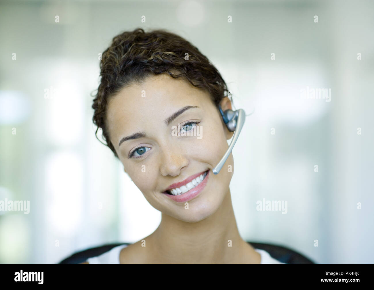 Woman wearing headset Stock Photo - Alamy