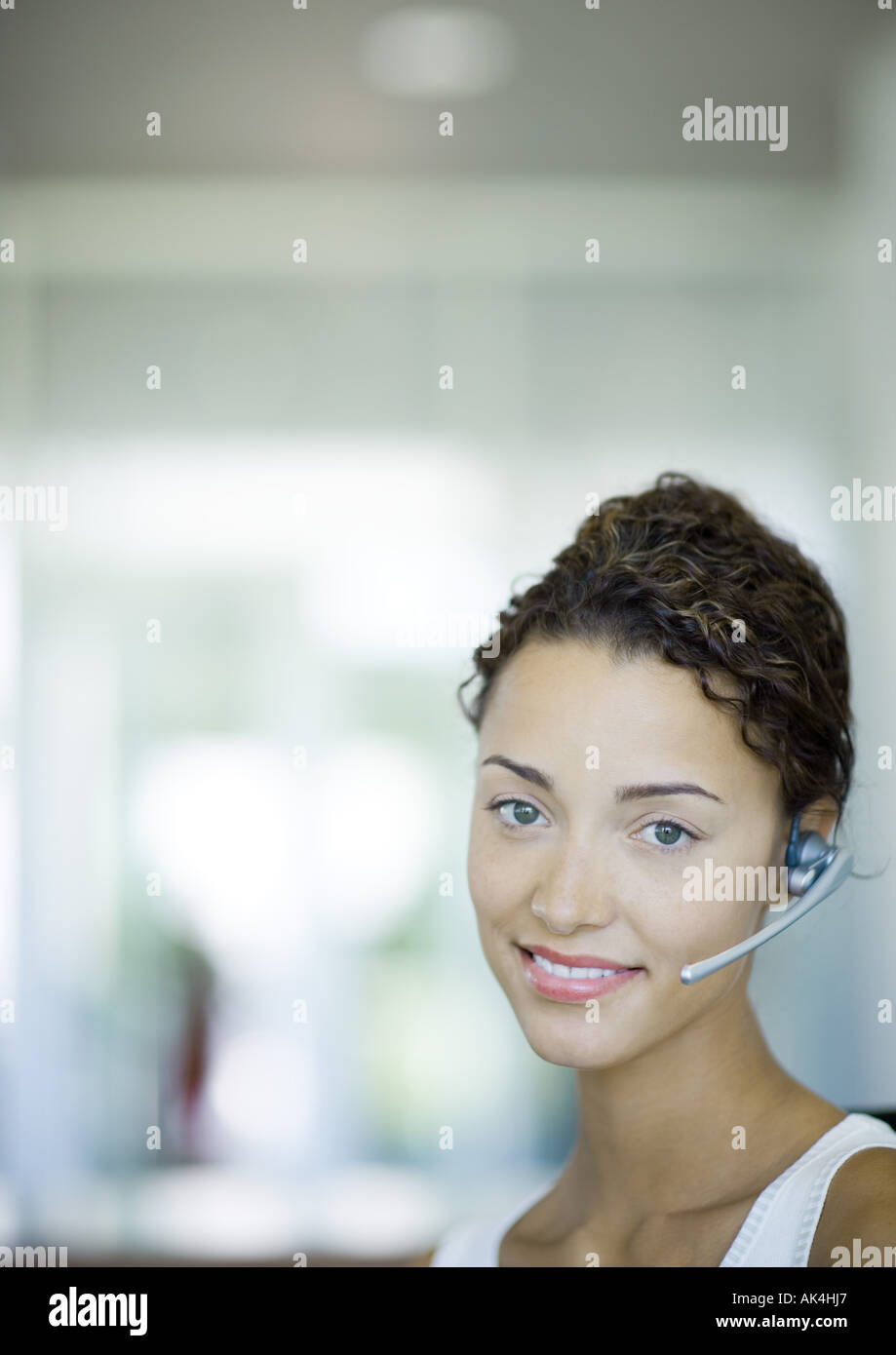 Woman wearing headset Stock Photo - Alamy