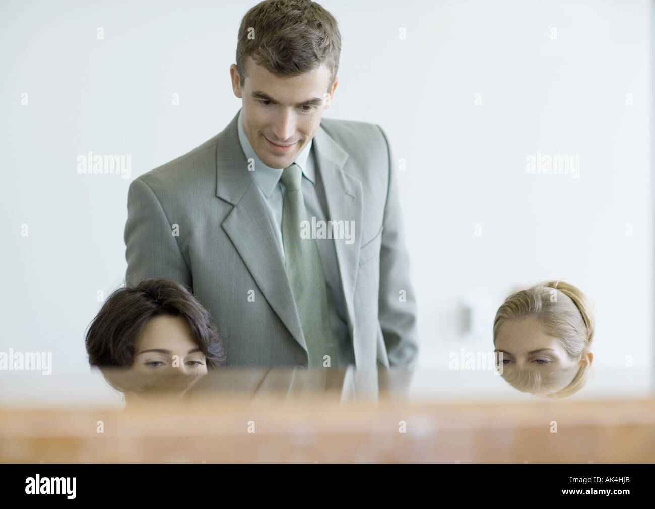 Receptionist work behind counter hi-res stock photography and images ...
