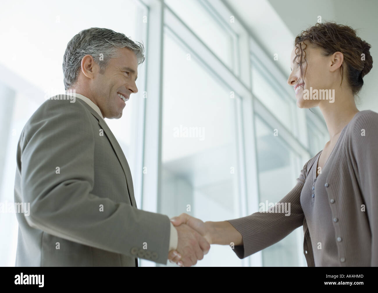 Business people shaking hands Stock Photo - Alamy