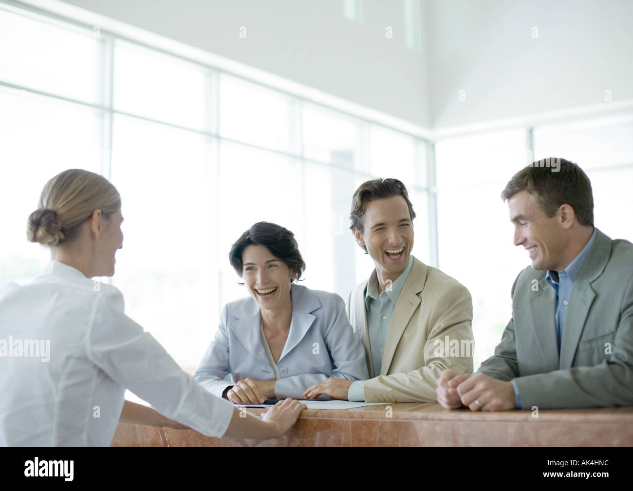 Laughing clientele hi-res stock photography and images - Alamy