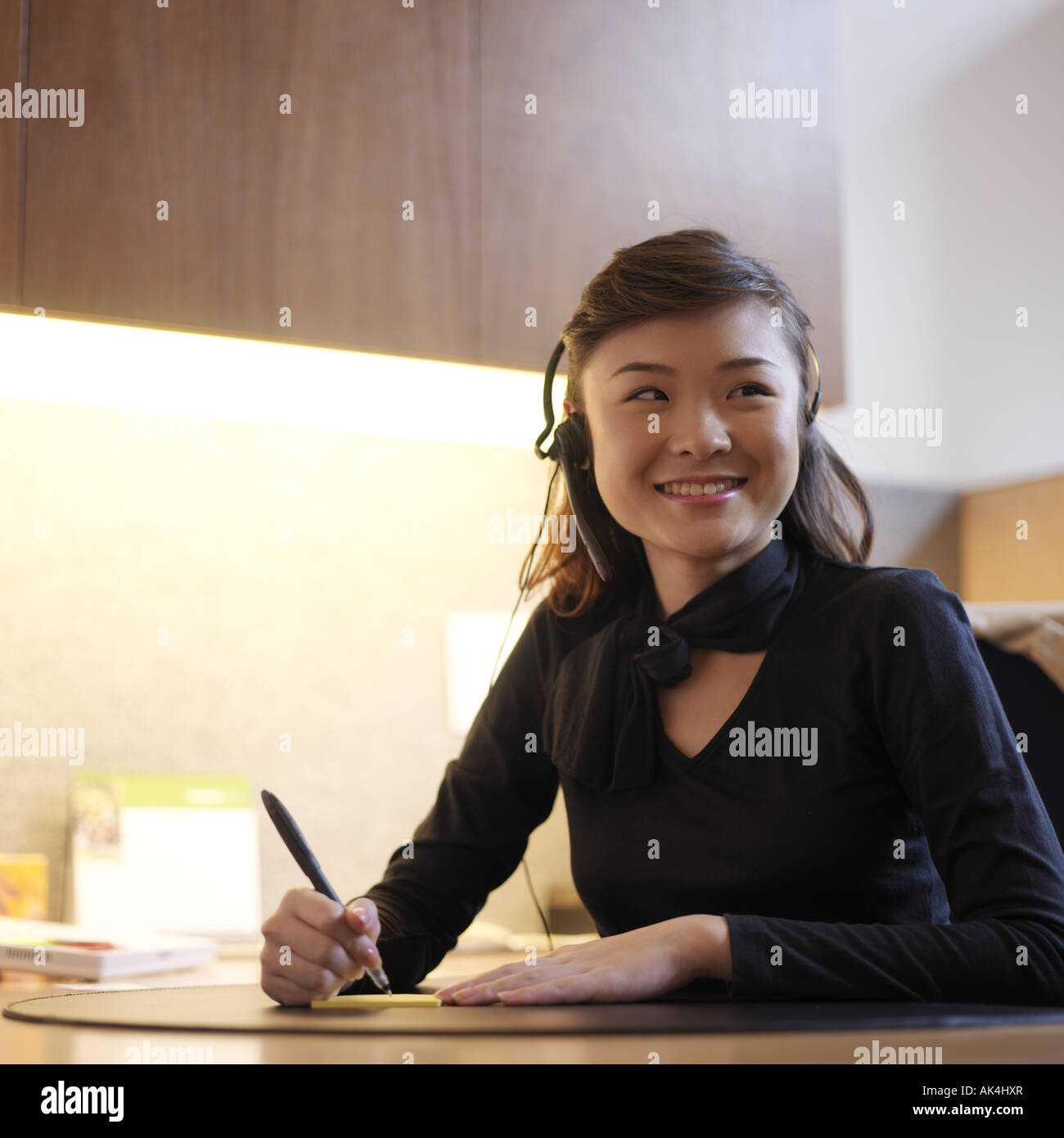 Singapore women worker hi-res stock photography and images - Alamy