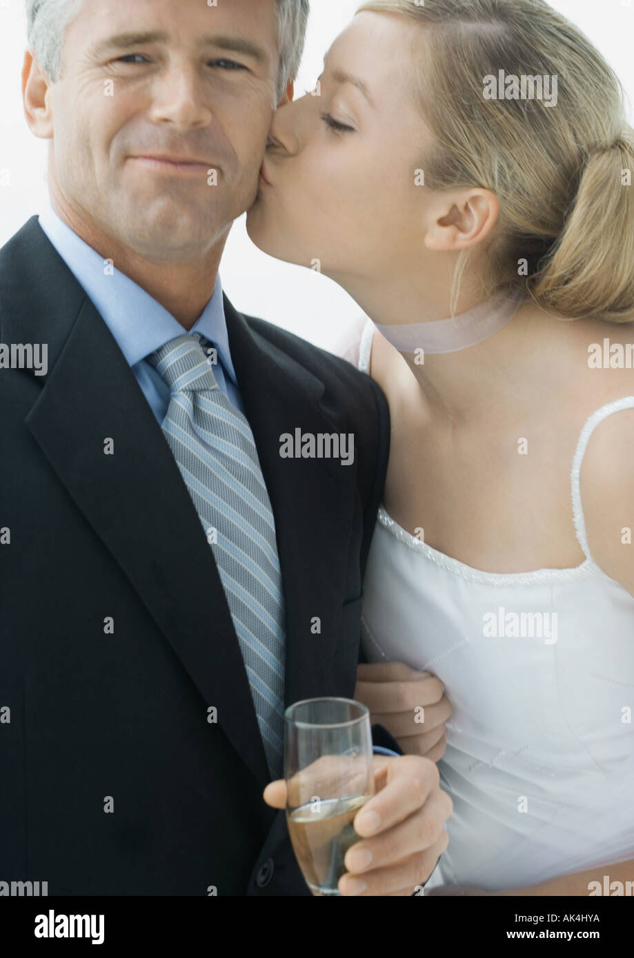 Bride kissing father Stock Photo - Alamy