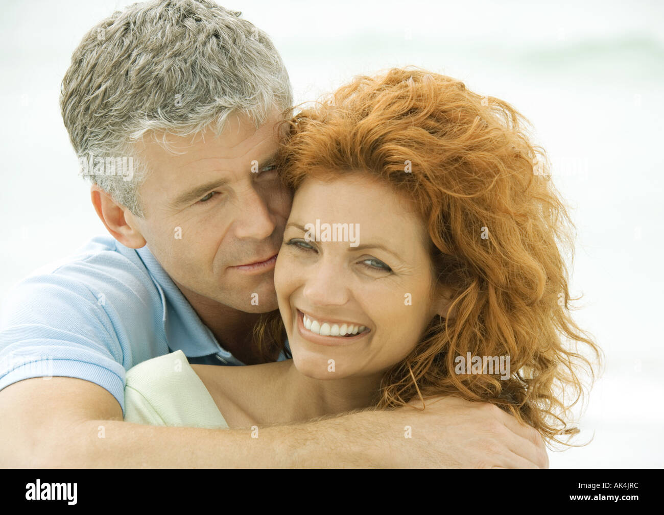 Happy mature couple embracing tenderly hi-res stock photography and ...
