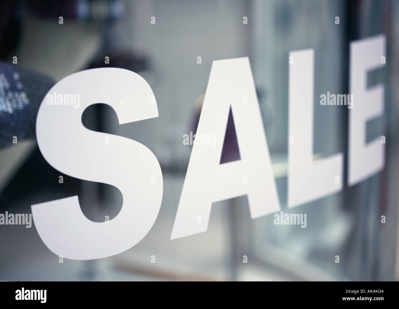 Sale sign in shop window Stock Photo - Alamy