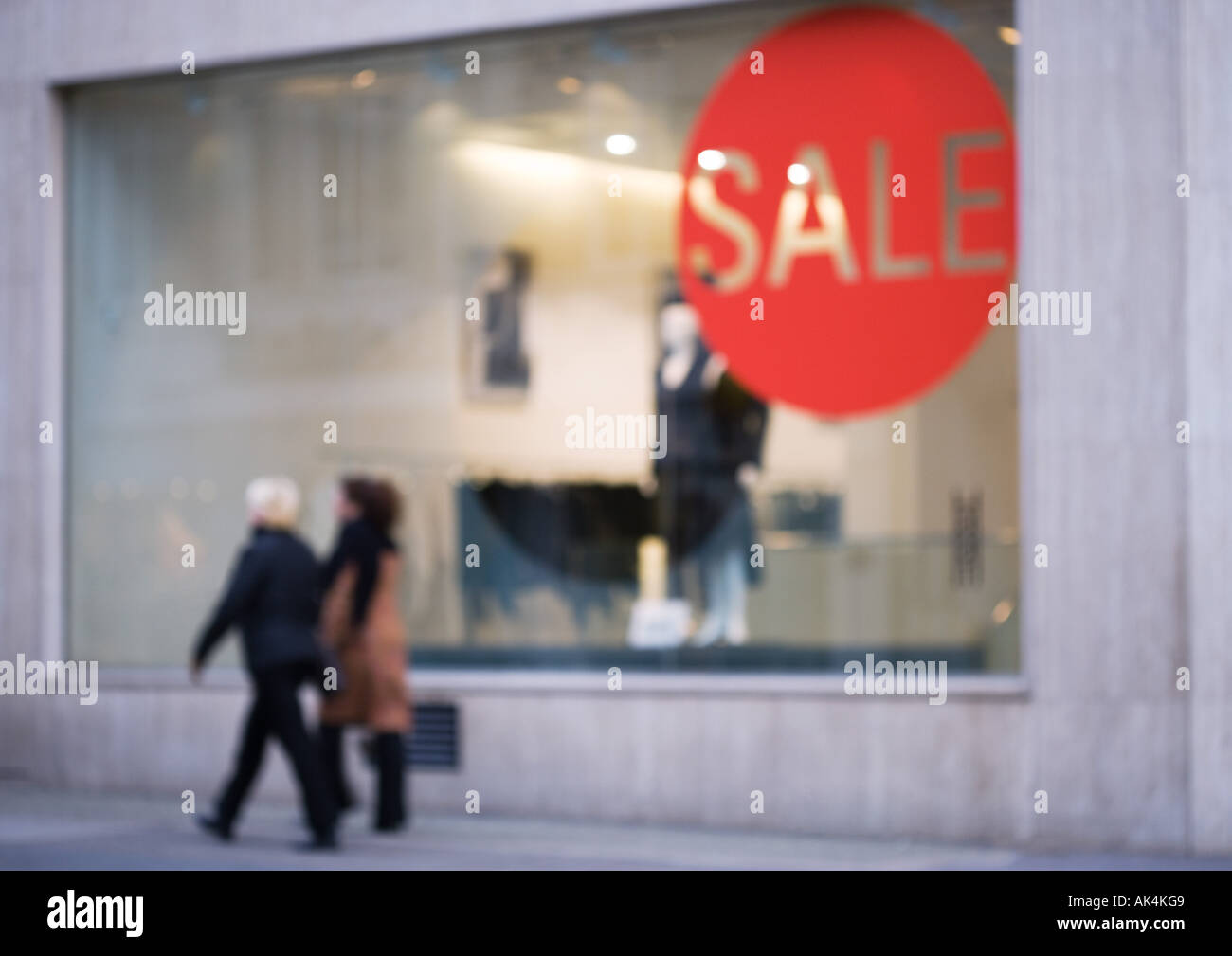Sale sign in shop window Stock Photo - Alamy