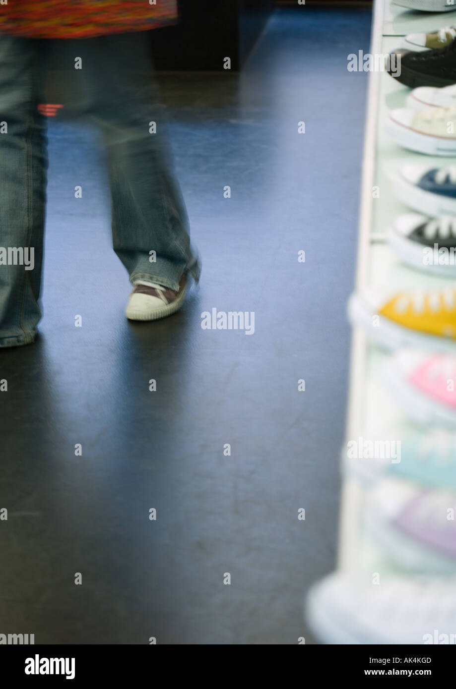 Canvas shoes lined up in store Stock Photo - Alamy