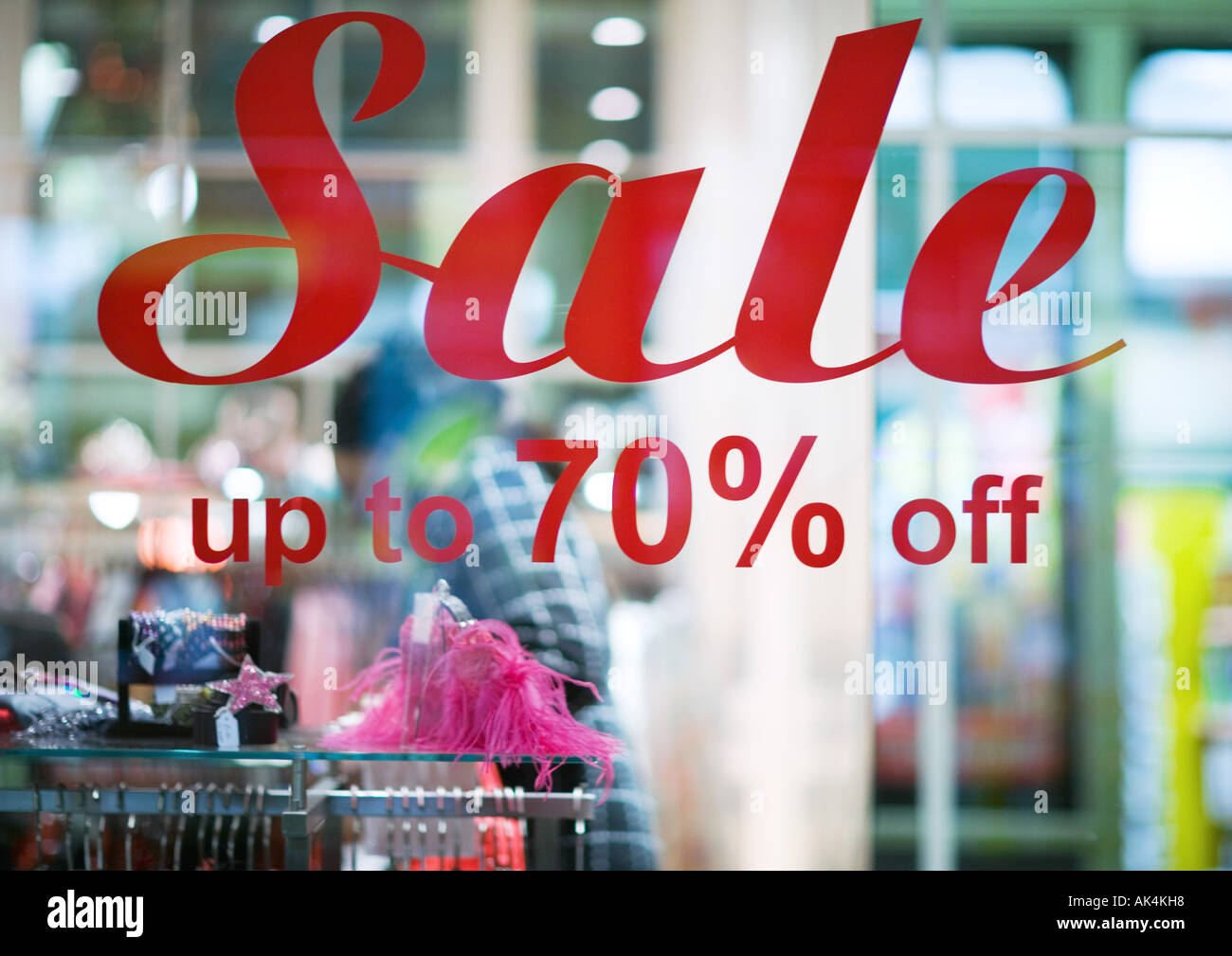 Sale sign in shop window Stock Photo - Alamy