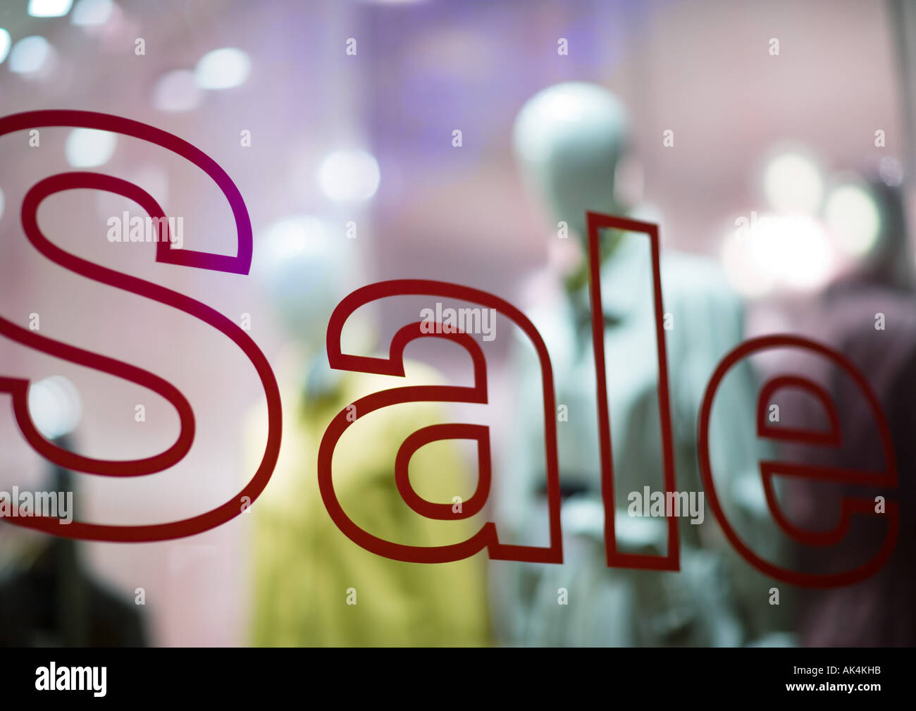 Sale sign in shop window Stock Photo - Alamy