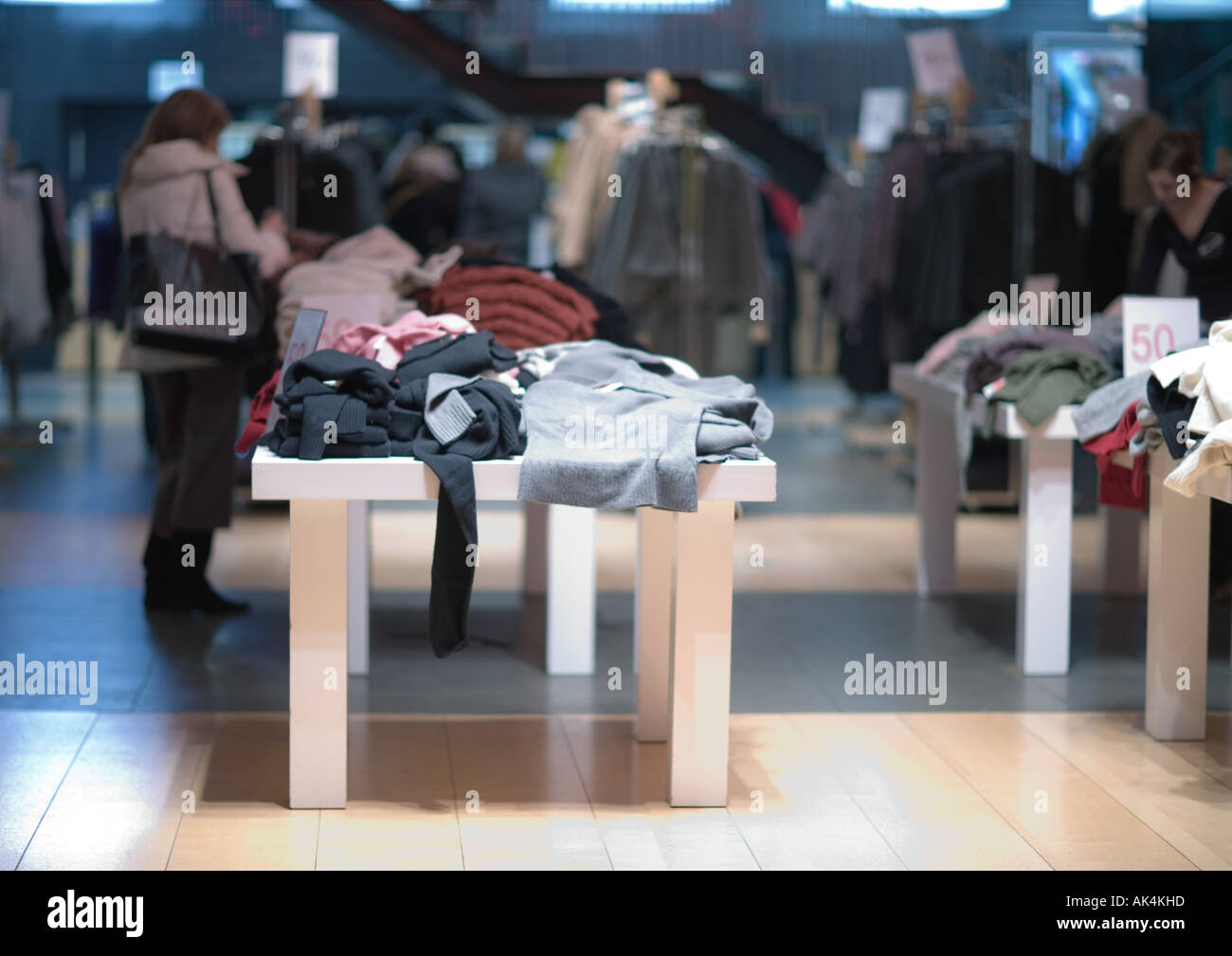 Woman shops ready wear hi-res stock photography and images - Alamy