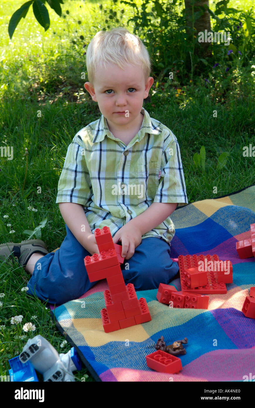 little boy plays with lego Stock Photo - Alamy