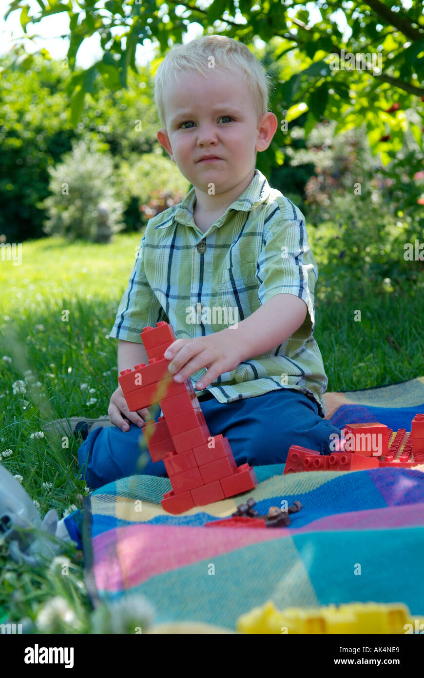 little boy plays with lego Stock Photo - Alamy