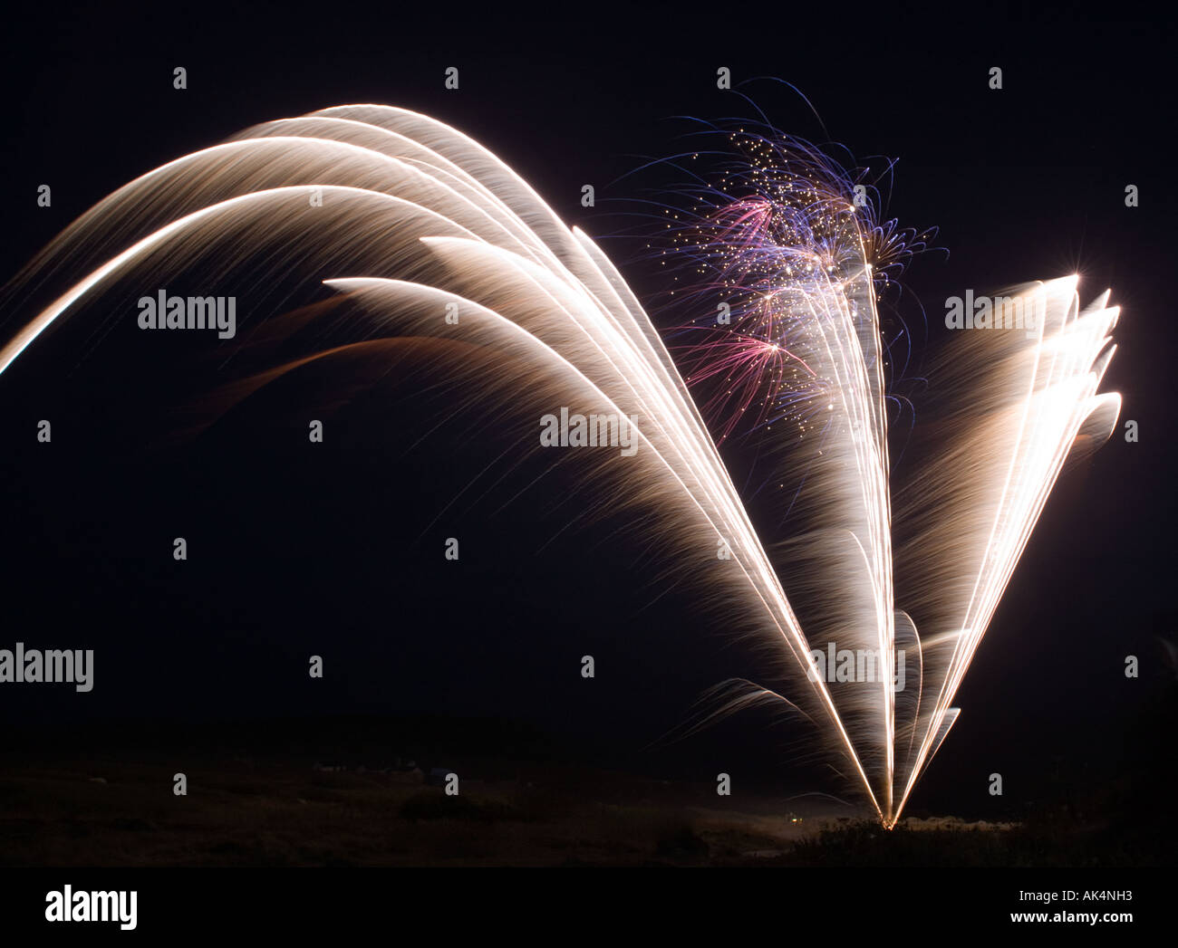 Ground based arches of white fireworks Stock Photo - Alamy