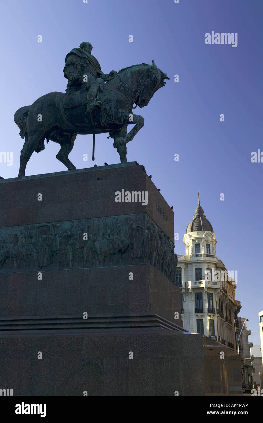The statue of General Artigas stands in silhouette over his tomb ...