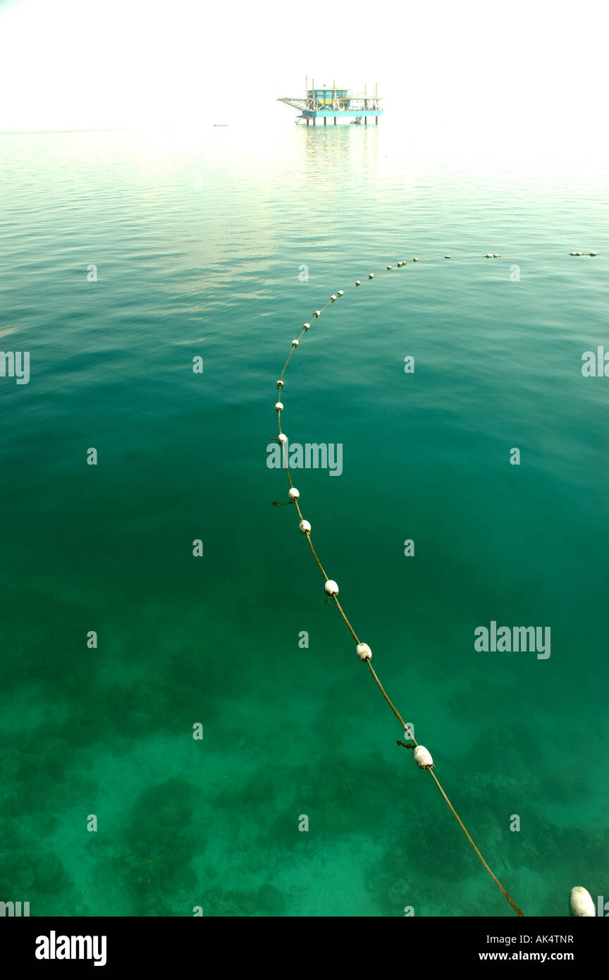 Oil rig off the coral reef of mabul island, Borneo Stock Photo - Alamy