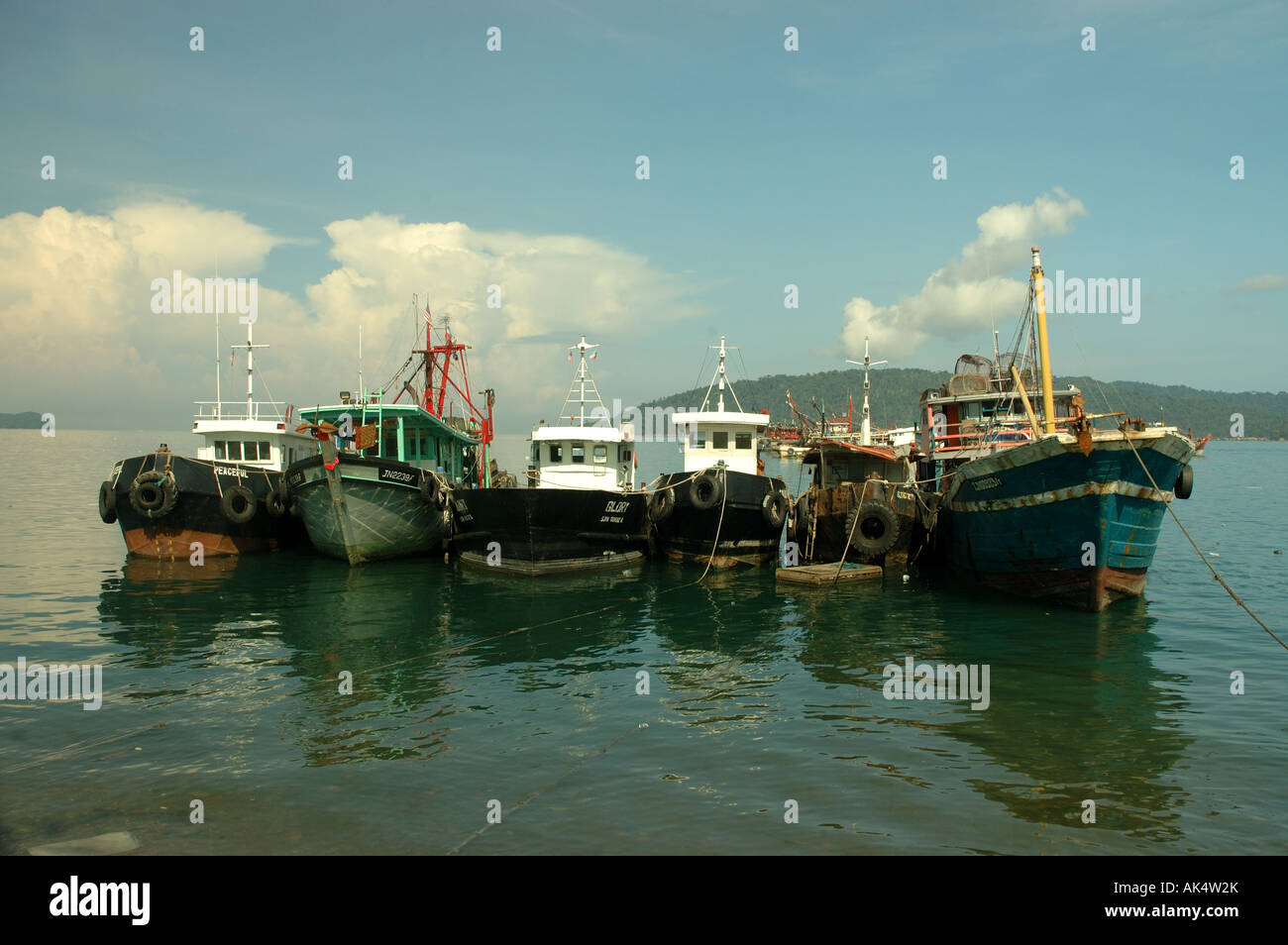 fishing boats in the port of kota kinabalu in borneo Stock Photo - Alamy