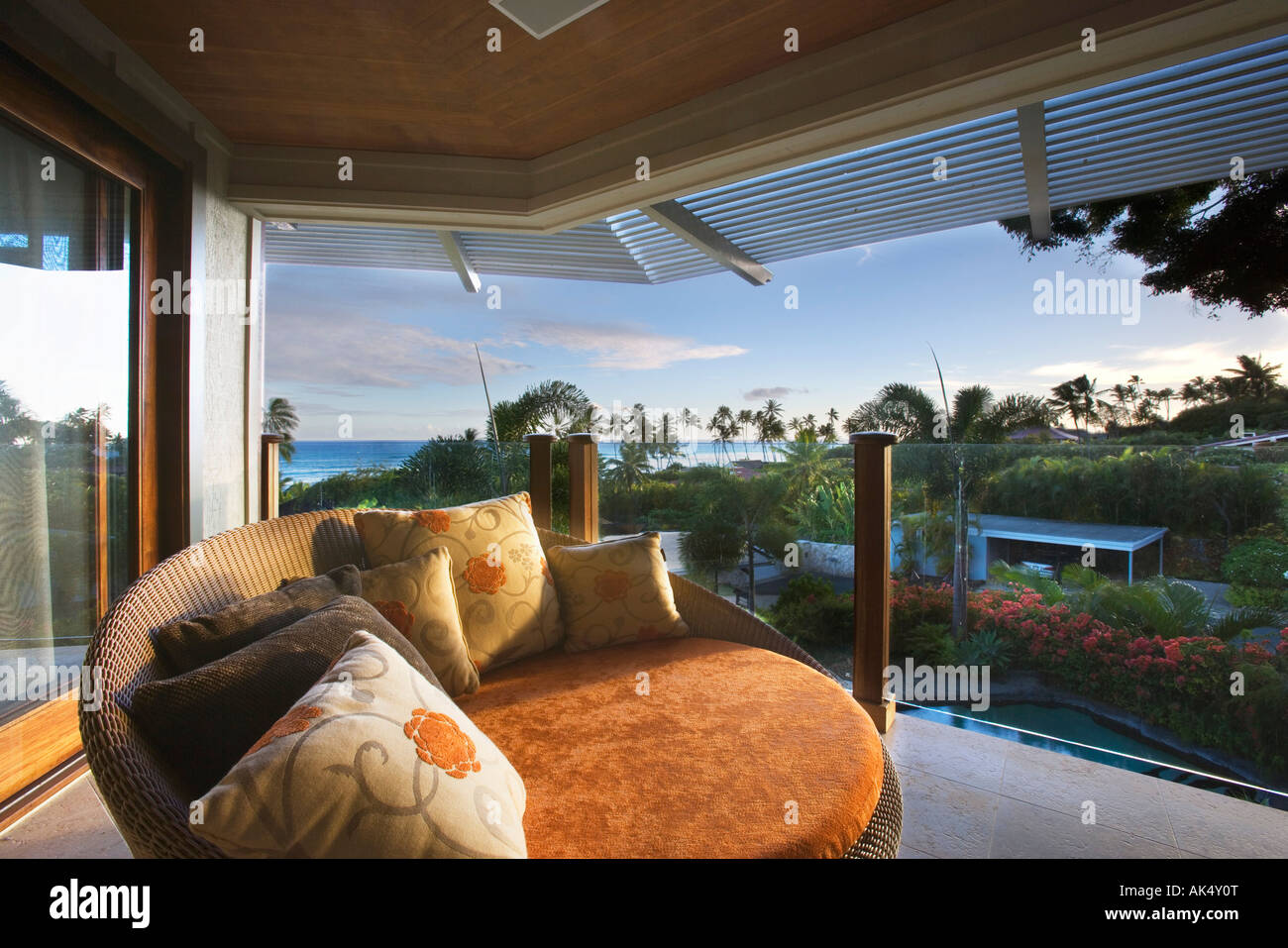 Large Round Orange Chair on Balcony Stock Photo - Alamy