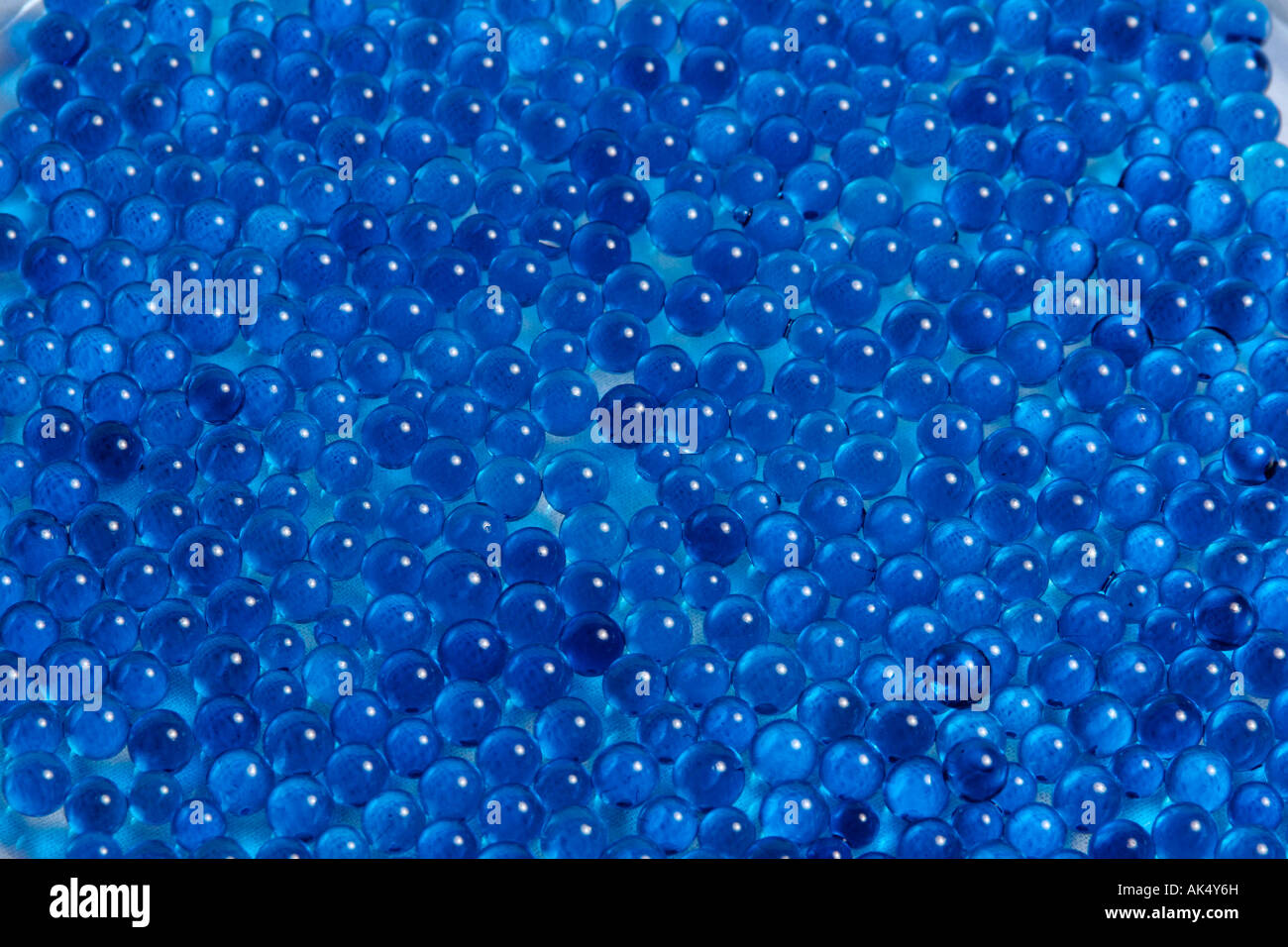 Blue balls arranged in a pattern Stock Photo - Alamy
