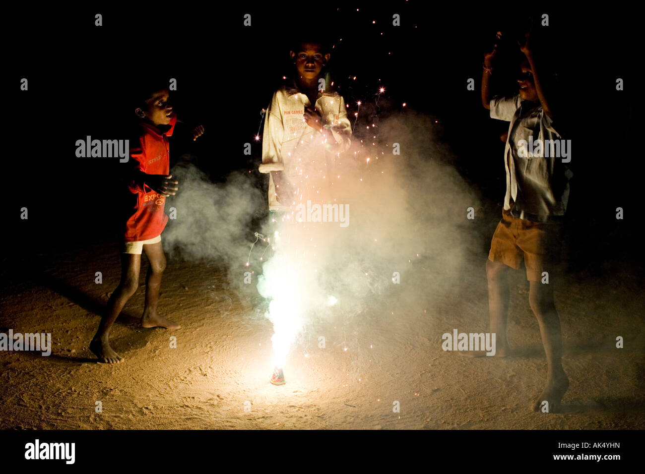 People dancing around fire night hi-res stock photography and images ...