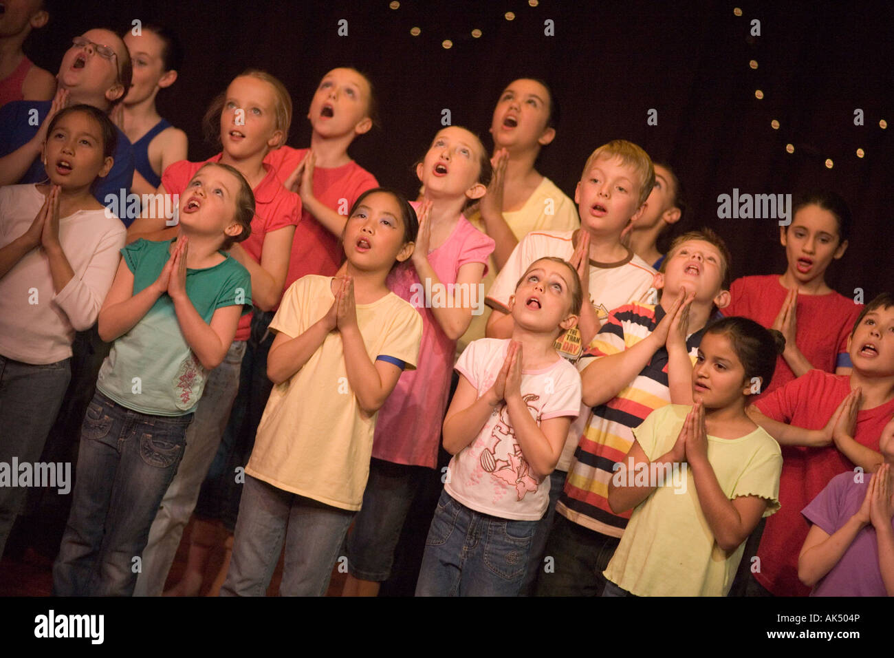 Young singers appear in a dance shool production uk Stock Photo - Alamy