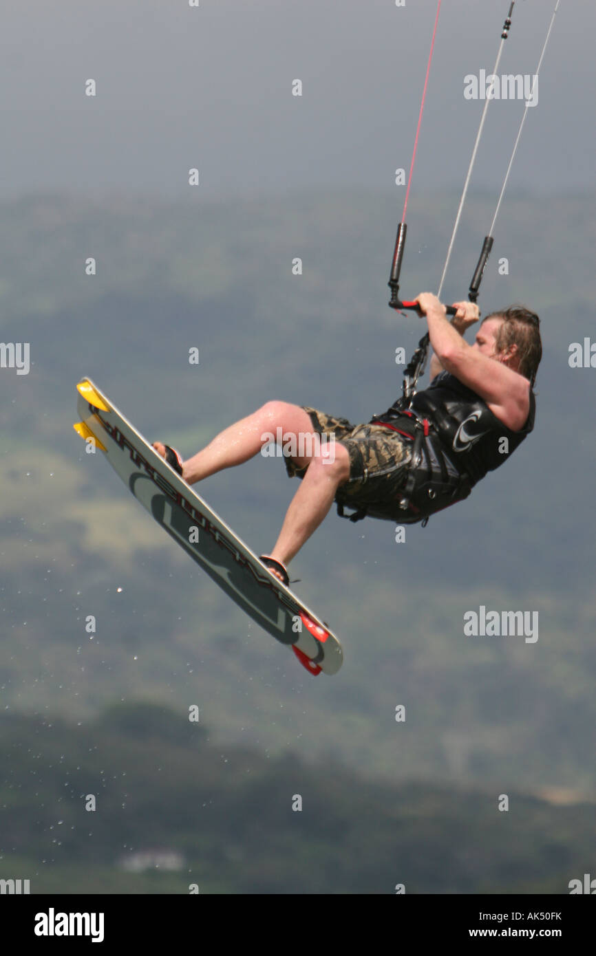 kite boarding in costa rica lake arenal Stock Photo - Alamy