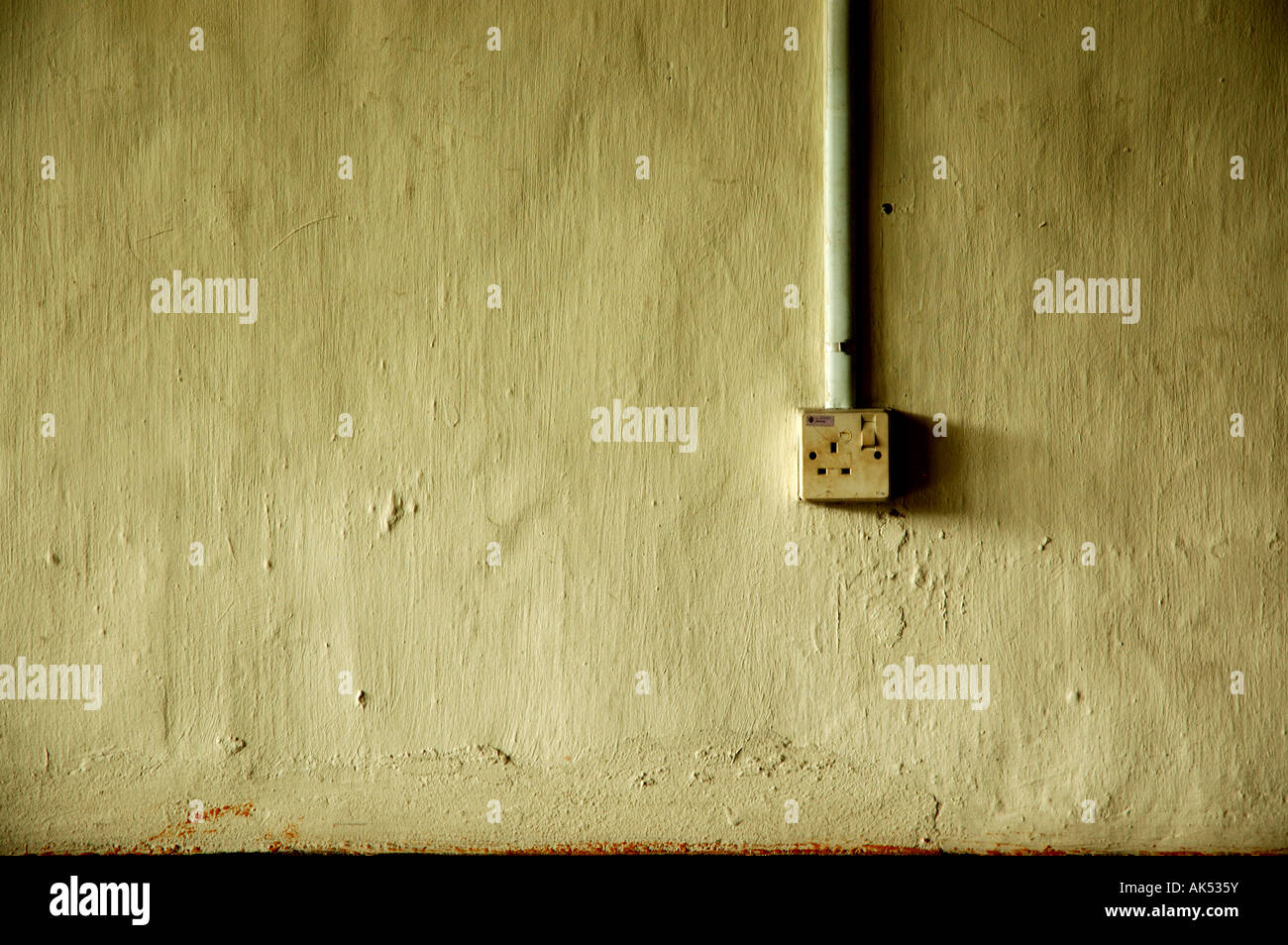 Single Plug socket on a wall Stock Photo - Alamy