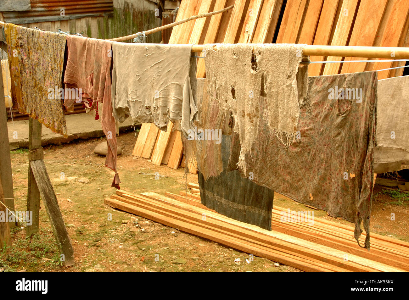 Old rags and laundry hanging out to dry in Laos, Asia Stock Photo - Alamy