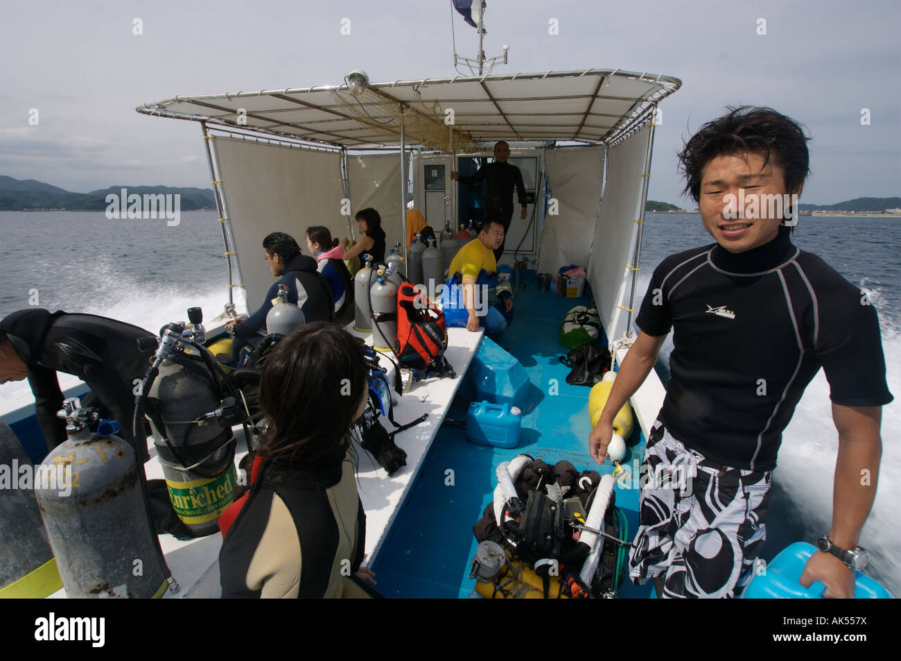 Divers prepare on dive boat in Kushimoto. Japan Stock Photo - Alamy