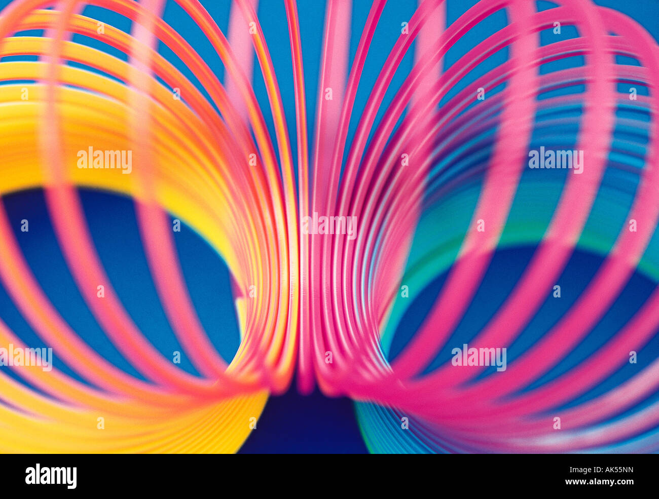 Still life, Close up of coiled plastic spring Stock Photo - Alamy