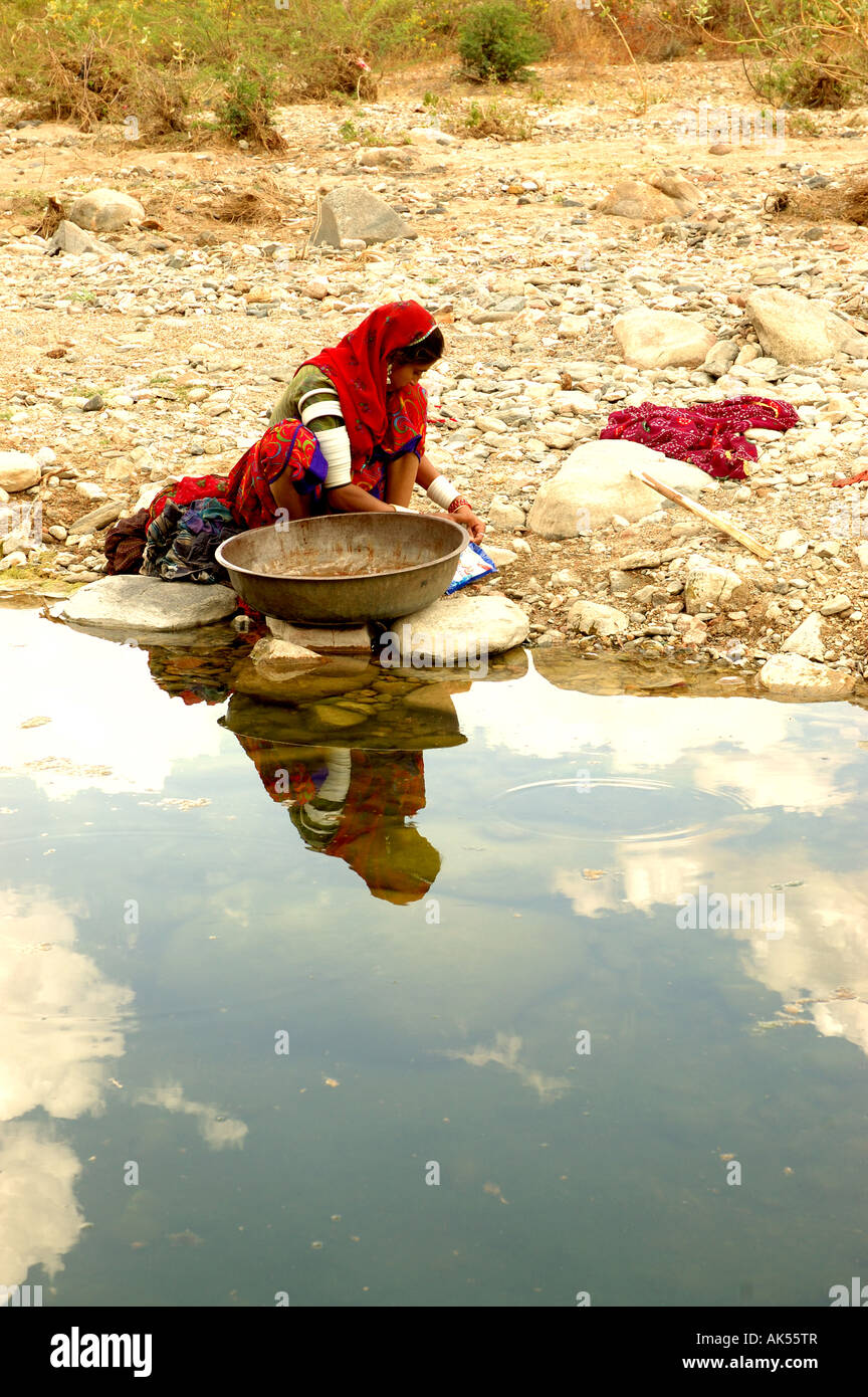 Lady washing clothes in india hi-res stock photography and images - Alamy
