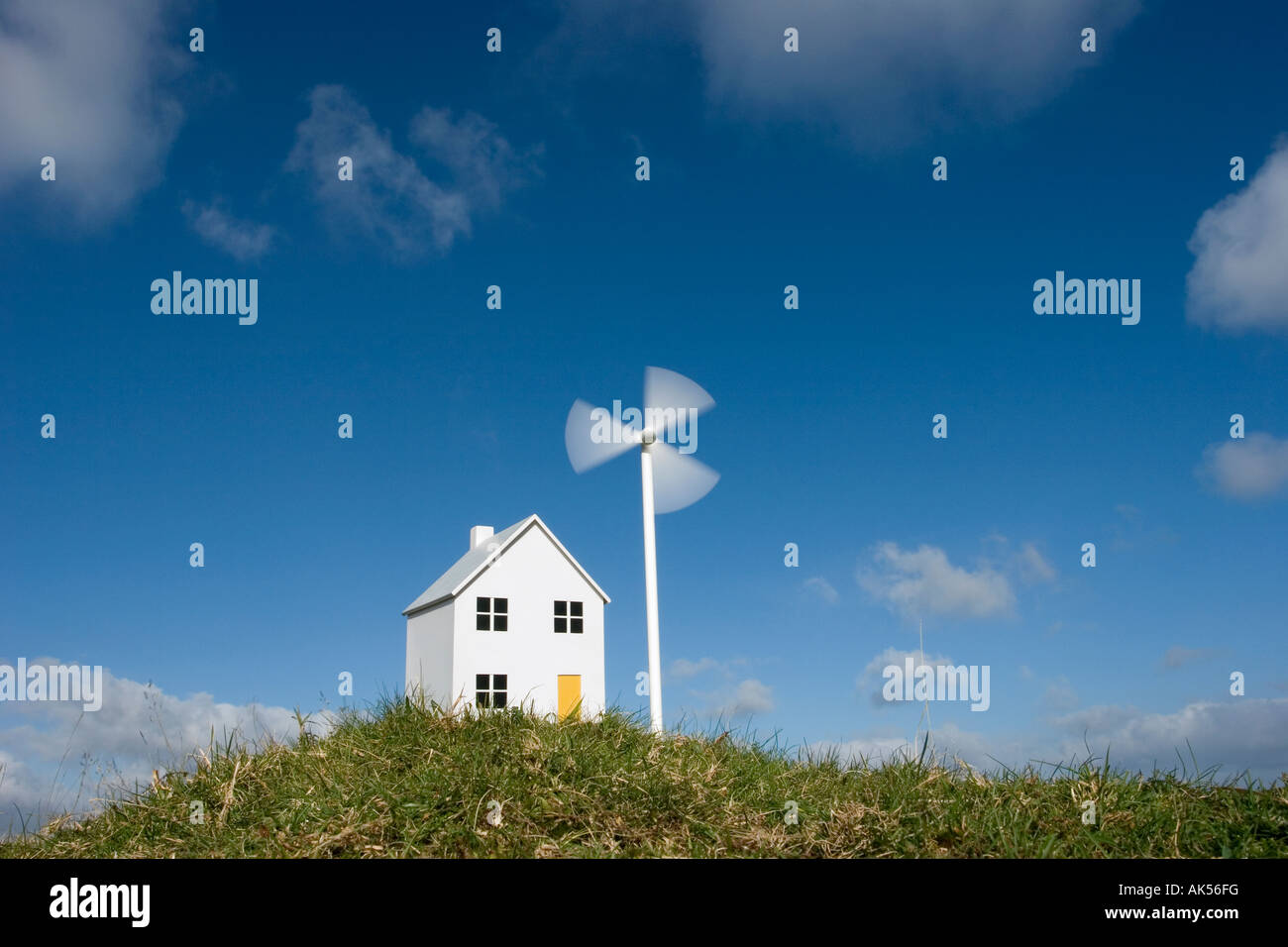 Model house and wind turbine Stock Photo - Alamy