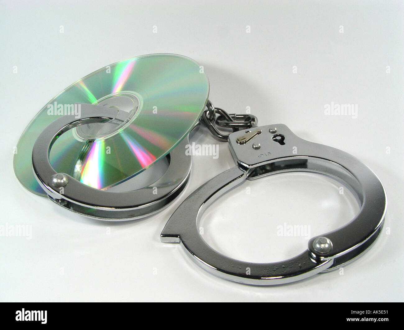 Data cd handcuffs hi-res stock photography and images - Alamy