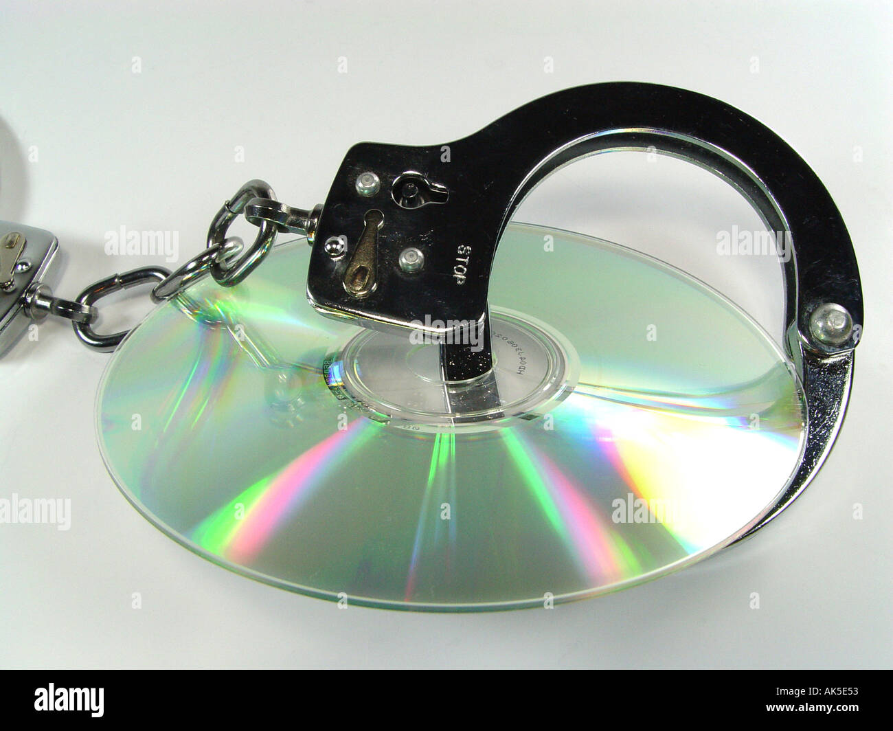 Data cd handcuffs hi-res stock photography and images - Alamy