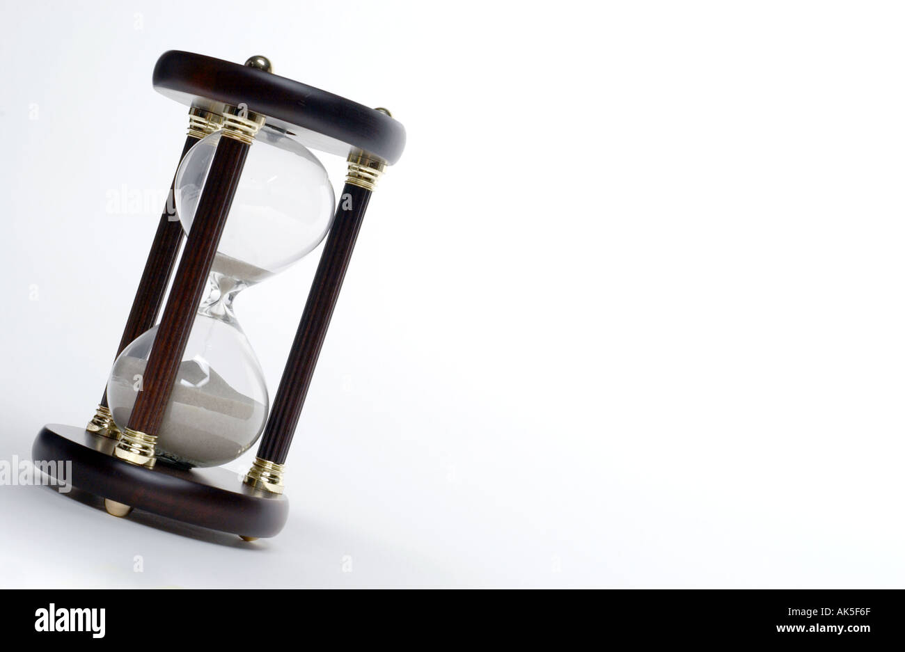 horizontal color image of an hourglass against a white background Stock ...