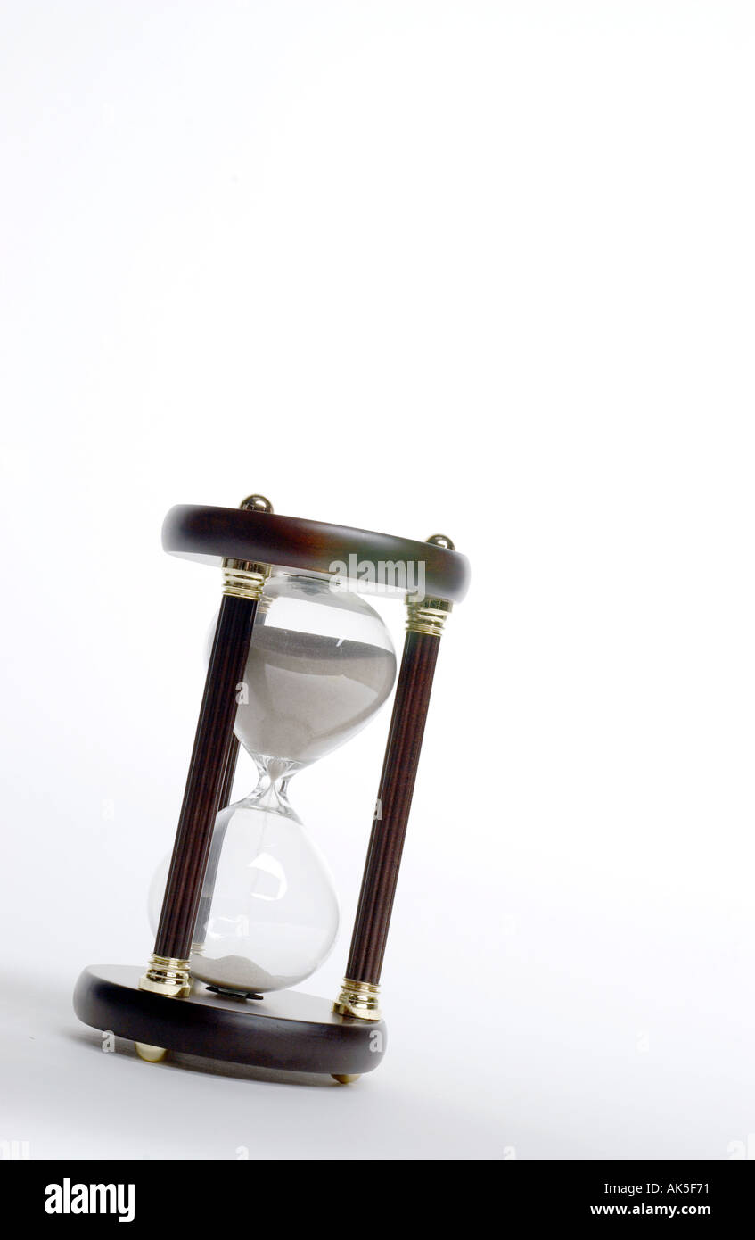 Vertical color image of an hourglass against a white background Stock ...