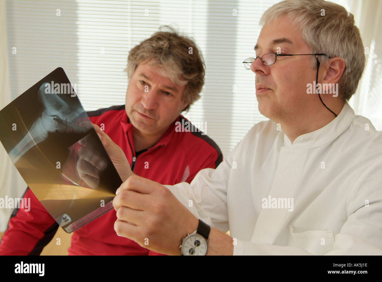 man with the doctor Stock Photo - Alamy